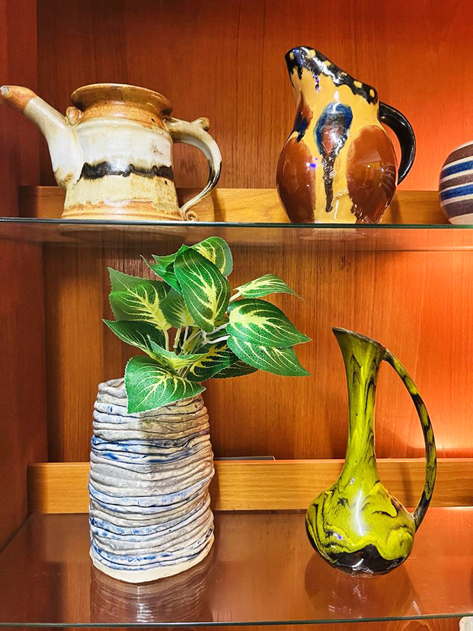 These aren't just ceramic vases – they're time capsules of design, each curve and glaze telling stories of bygone dinner parties.