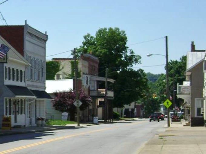 Sunlight dapples through mature trees lining Utica's residential streets, where historic homes tell stories of generations who've called this charming village home.