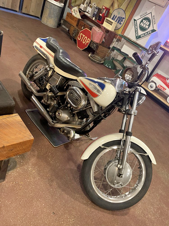 This vintage motorcycle isn't just transportation&mdash;it's mechanical sculpture, a chrome-and-steel time machine waiting for someone to bring its engine roaring back to life.