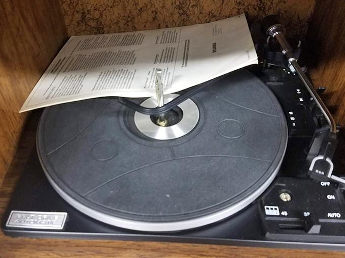 Vinyl revival heaven! This turntable awaits its next owner and the warm, crackling soundtrack of memories yet to be made.