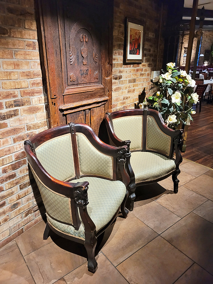 The waiting area isn't just functional &ndash; it's a glimpse into steakhouse elegance with antique chairs that have witnessed countless "Is our table ready yet?" conversations.