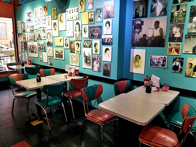 The wall of photos isn't just decoration&mdash;it's a visual history of Pittsburgh. Those turquoise chairs aren't just seating; they're time machines to simpler days.