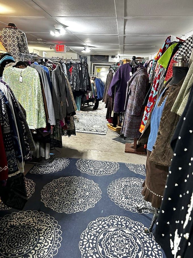 A corridor of vintage fashion where every garment has already lived a life and is ready to join yours with stories sewn into every seam.