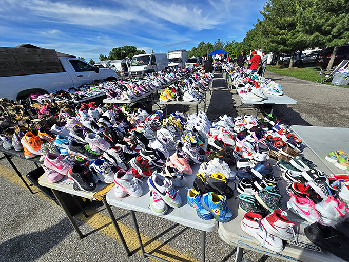 Hundreds of sneakers arranged like a rainbow where every foot can find its perfect match. 
