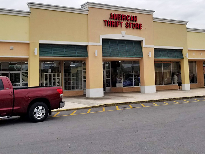 The bright yellow facade of American Thrift Store promises treasure hunting adventures behind those glass doors!