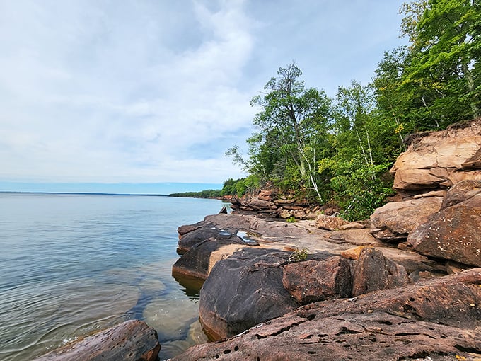 The red sandstone shoreline at Big Bay State Park looks like nature's own infinity pool stretching into Lake Superior.