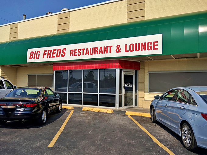 The green awning of Big Fred's beckons like an old friend. Simple outside, pizza paradise inside! 