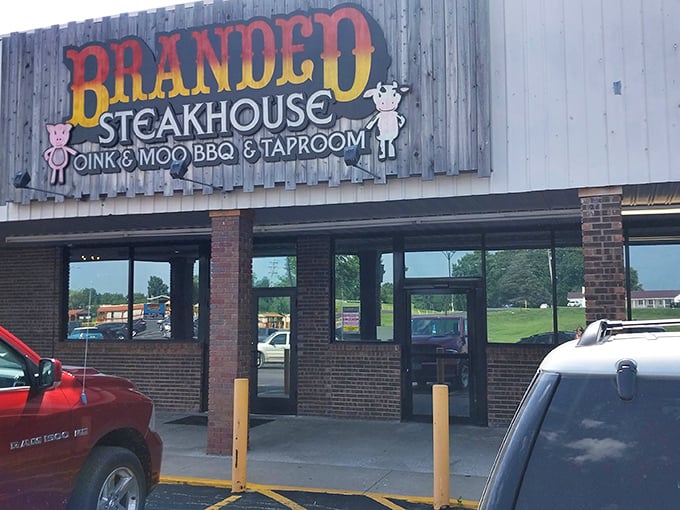 The colorful sign at Branded Steakhouse promises a playful twist on serious steak. Oink and Moo? Count me in!