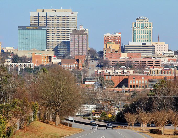 Columbia's skyline rises above the trees like a modest metropolis that won't empty your wallet. Southern charm meets capital city convenience!