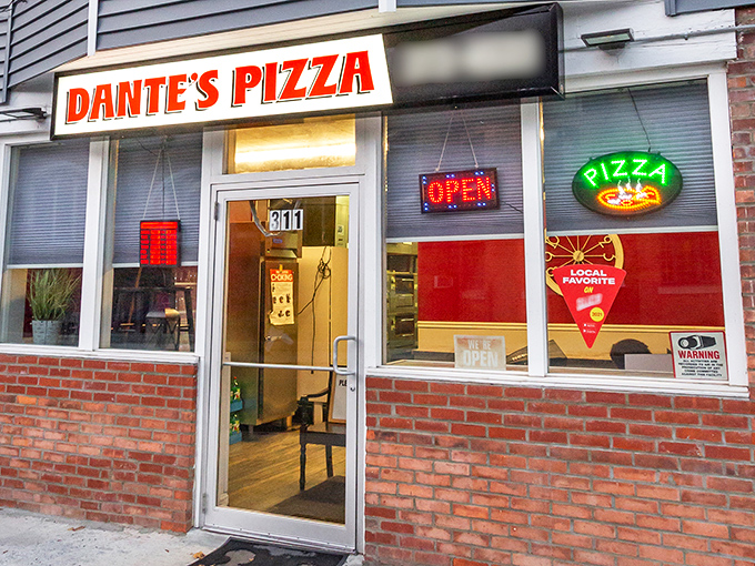 The glow of Dante's Pizza sign promises simple perfection—like finding a $20 bill in your winter coat.