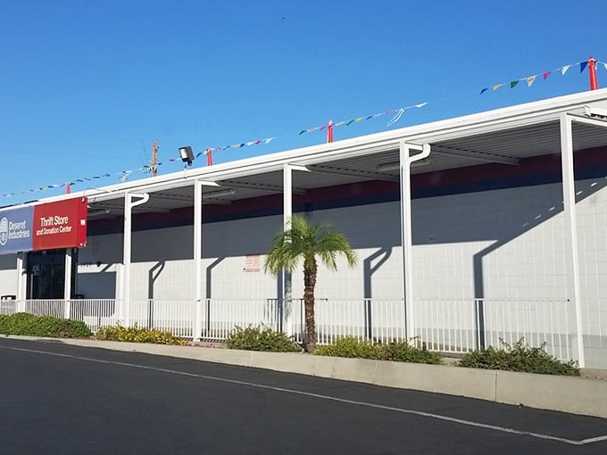 The colorful flags outside Deseret Industries promise a fiesta of finds inside this treasure-filled warehouse.