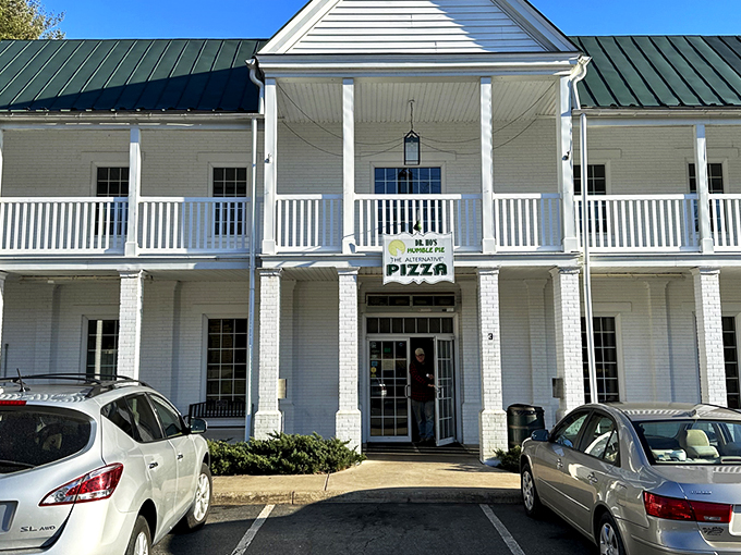 Dr. Ho's Humble Pie's charming white colonial facade hides a pizza paradise that's anything but humble in flavor.