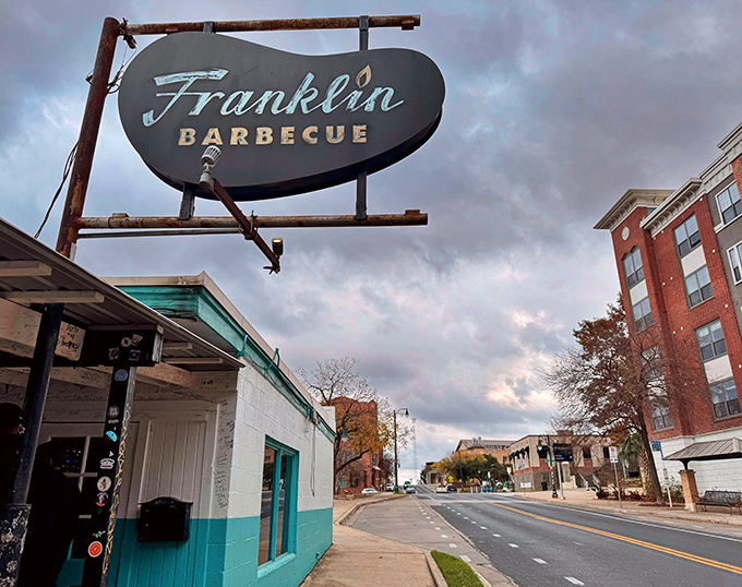 Franklin Barbecue's iconic turquoise building and vintage sign &ndash; where barbecue dreams and morning lines begin.