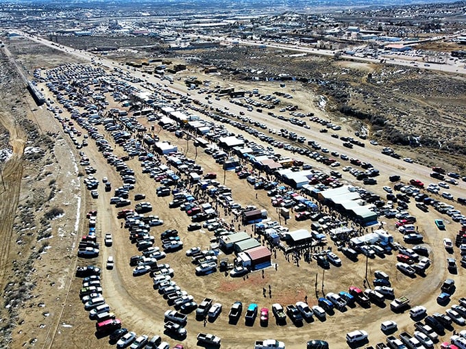 Aerial view of Gallup Flea Market stretching across the desert like a pop-up city of treasures and bargains.