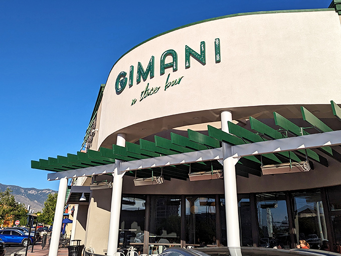 Gimani's sleek exterior promises pizza paradise ahead. That curved fa&ccedil;ade and green pergola practically whisper "come in, the cheese awaits."