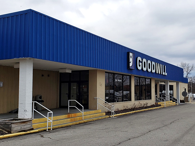 The iconic blue Goodwill storefront in Springfield stands like a beacon of bargain possibilities, promising treasures within those sliding doors.