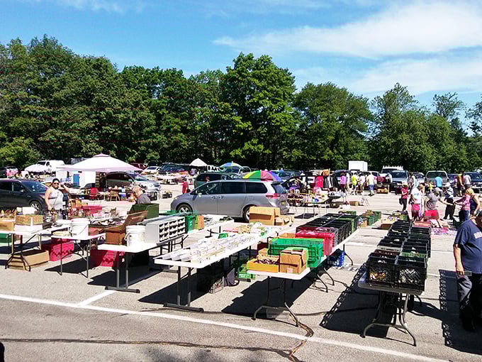 Tables stretch to the horizon at Grafton Flea Market, where treasure hunters navigate a sea of possibilities under blue Massachusetts skies.