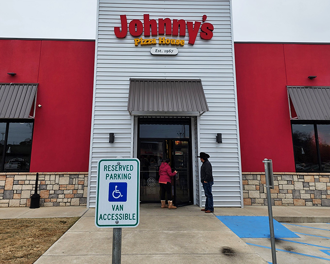 The bright red exterior of Johnny's is like a beacon calling all pizza lovers home. Simple, bold, and promising deliciousness inside.