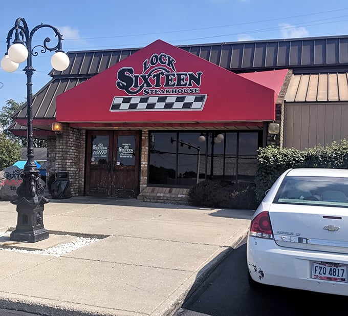 Lock Sixteen Steakhouse: That red awning isn't just calling your name&mdash;it's practically shouting "get in here for a steak that'll make your taste buds do a victory lap!"