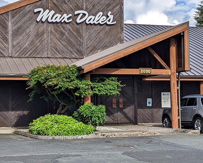 The rustic wooden charm of Max Dale's exterior welcomes you like an old friend with a secret stash of prime beef.