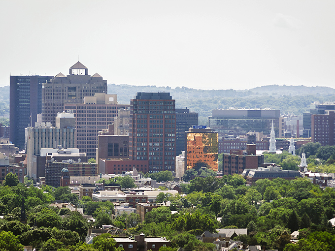 New Haven's skyline stretches toward the horizon, where historic architecture meets modern living in Connecticut's cultural hub.