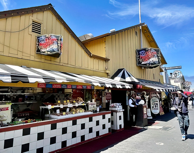 The iconic checkered facade of Old Fisherman's Grotto – where seagulls line up for reservations almost as eagerly as the tourists.