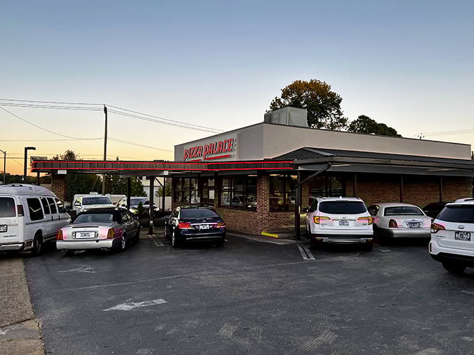 The classic Pizza Palace storefront promises a pizza experience that'll transport you back to simpler, more delicious times.