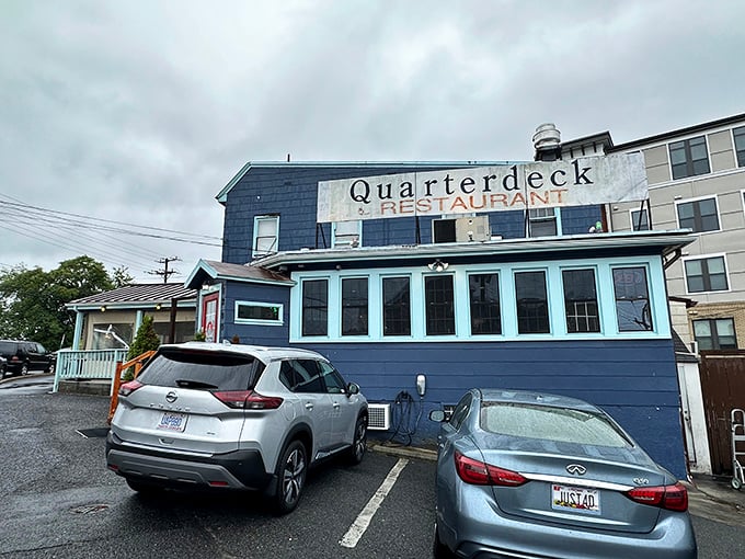 The blue exterior of Quarterdeck might not scream "seafood paradise," but locals know this Arlington gem hides crab treasures within!