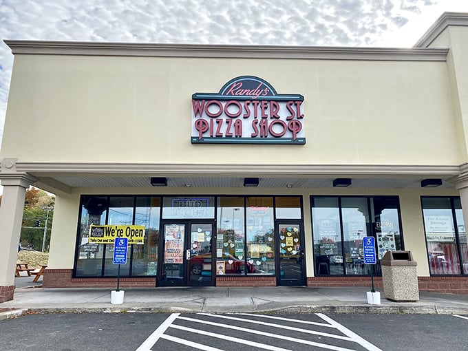 Randy's Wooster Street Pizza: That neon sign isn't just a beacon&mdash;it's a promise of pizza paradise waiting inside this Manchester strip mall gem.