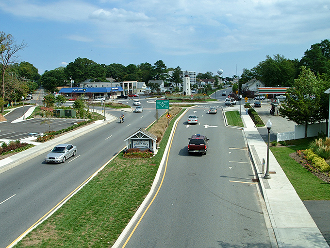 Rehoboth Beach's main avenue welcomes visitors with wide sidewalks and charming storefronts &ndash; small-town coastal living at its finest!