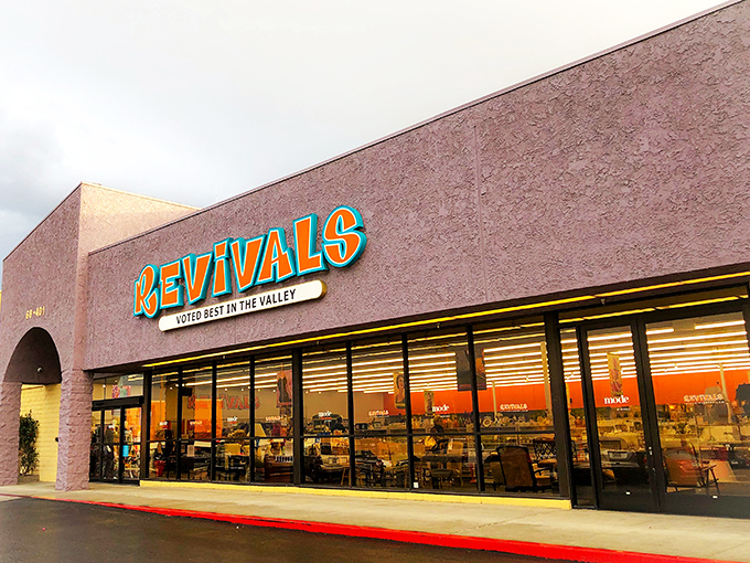 The bold, colorful "Revivals" sign welcomes bargain hunters like a beacon of thrifty hope in Cathedral City.