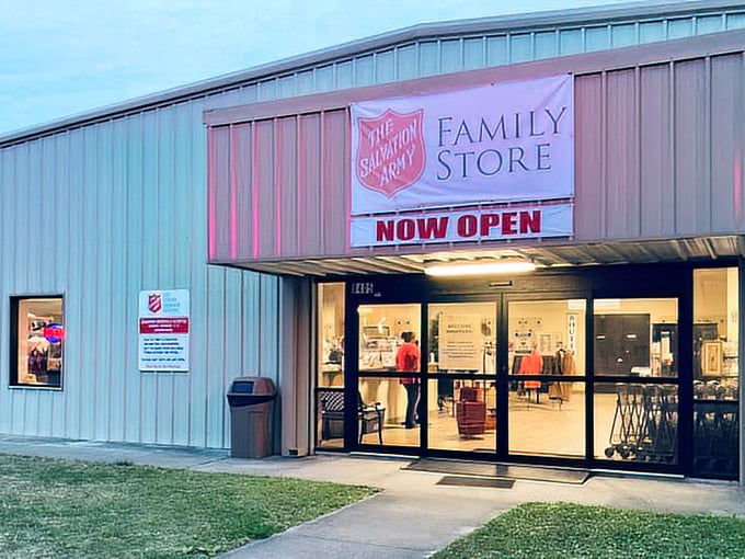 The Salvation Army Family Store welcomes bargain hunters with its bright "NOW OPEN" sign&mdash;a treasure cave disguised as a simple metal building.