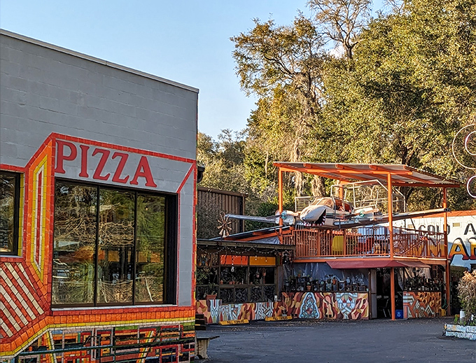 Satchel's Pizza: Where art meets appetite! This colorful Gainesville landmark promises pizza with personality in every funky corner.