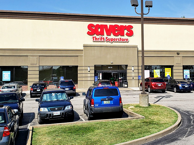 The bright red Savers sign beckons like a lighthouse to bargain hunters. Treasure awaits inside this thrift superstore!