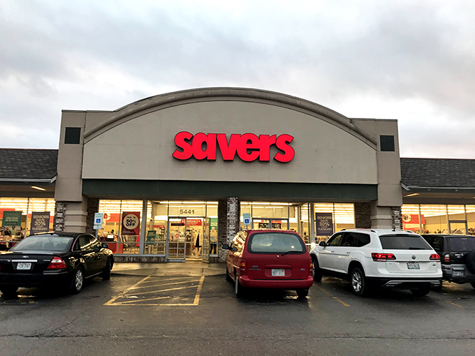 The bright red Savers sign beckons like a lighthouse to thrift enthusiasts. This treasure trove might require a map and compass to navigate fully!