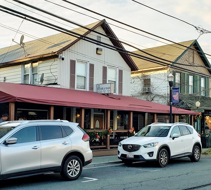 The unassuming exterior of Steak & Main hides a carnivore's paradise. That red awning is basically a superhero cape for steak lovers!