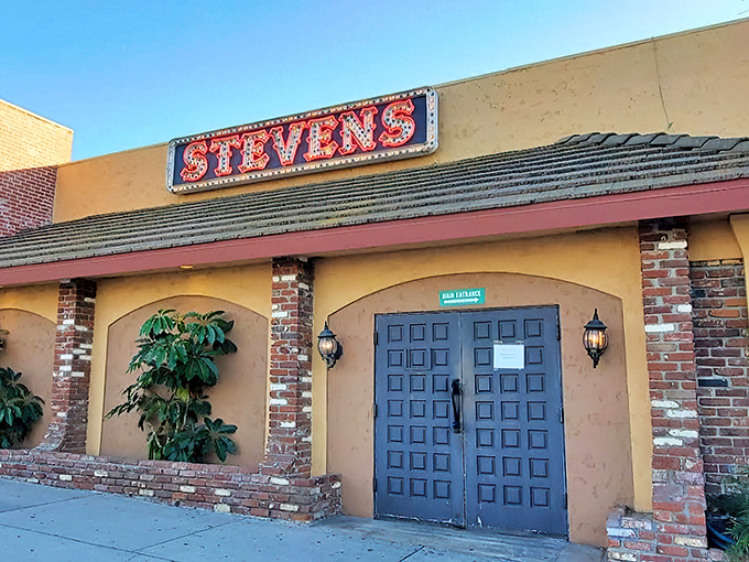 Steven's iconic sign glows with the promise of old-school dining magic. Where steaks sizzle and memories are made in Commerce.