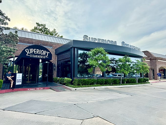 The brick façade and elegant awning promise what lies within – a temple to perfectly aged beef!