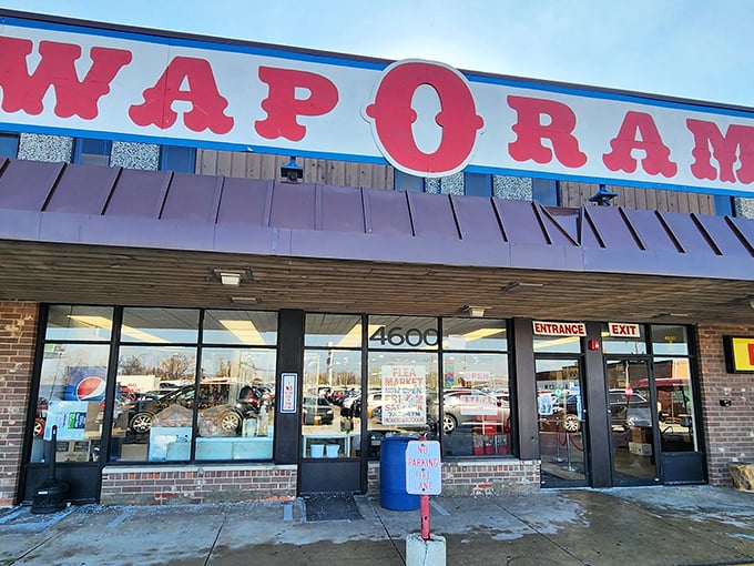 The iconic red Swap-O-Rama sign beckons like a Vegas marquee for bargain hunters. Treasure awaits inside!