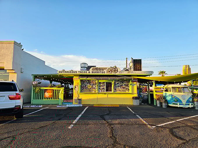 The Beach House's sunny yellow facade and vintage VW bus scream "coastal vacation" in the middle of Phoenix's desert landscape.