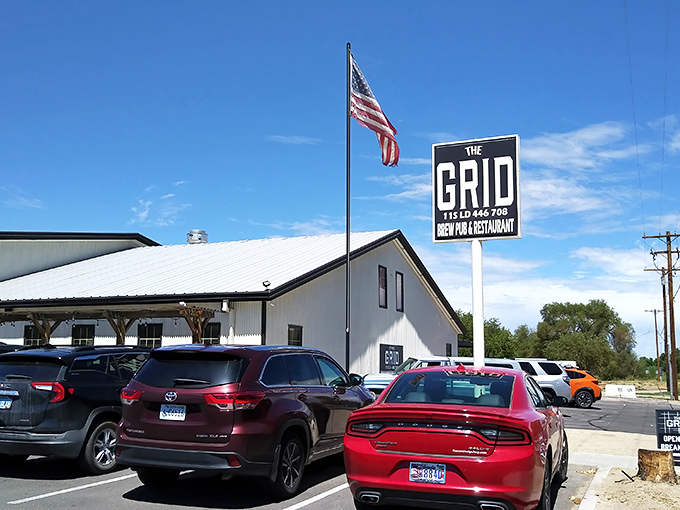 The Grid Bar & Grill stands proud under blue Nevada skies, where that American flag promises patriotic portions of perfectly seared steaks.
