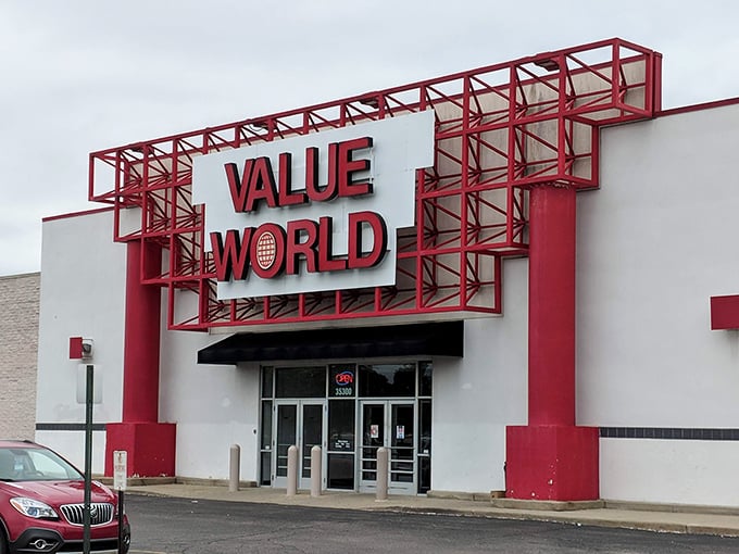 The iconic red Value World sign beckons like a lighthouse to thrift enthusiasts. Treasure hunting starts here!