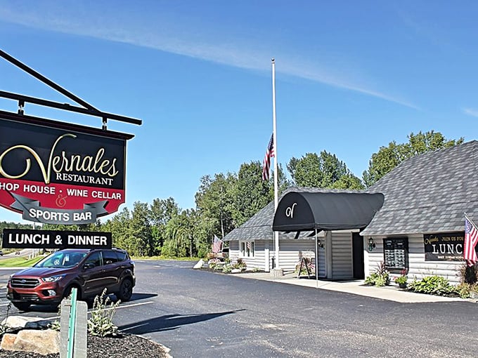 Vernales Restaurant's rustic log cabin exterior hides a steakhouse paradise. Like finding a diamond in a flannel shirt!