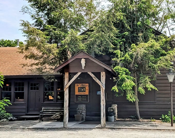 The Walpack Inn's rustic cabin exterior promises wilderness charm and hearty meals. Like finding a delicious secret in the woods!
