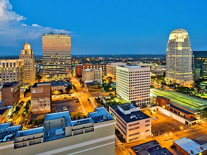 Winston-Salem's skyline glows like a golden invitation to affordable living where your retirement dreams actually fit your budget.