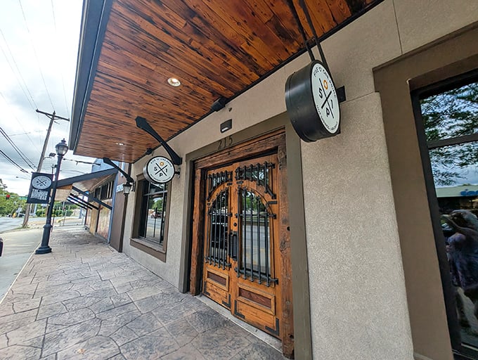 Rustic wooden doors and stone accents welcome you to 501 Prime &ndash; where steakhouse tradition meets Arkansas charm.