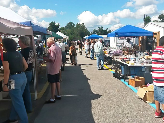 White tents dot the landscape like a peaceful village where art and agriculture meet perfectly. 