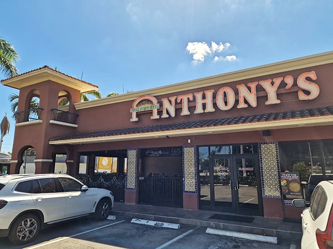 Palm trees and pizza paradise! Anthony's terracotta fa&ccedil;ade houses coal-fired magic that transforms simple dough into crispy, charred perfection.