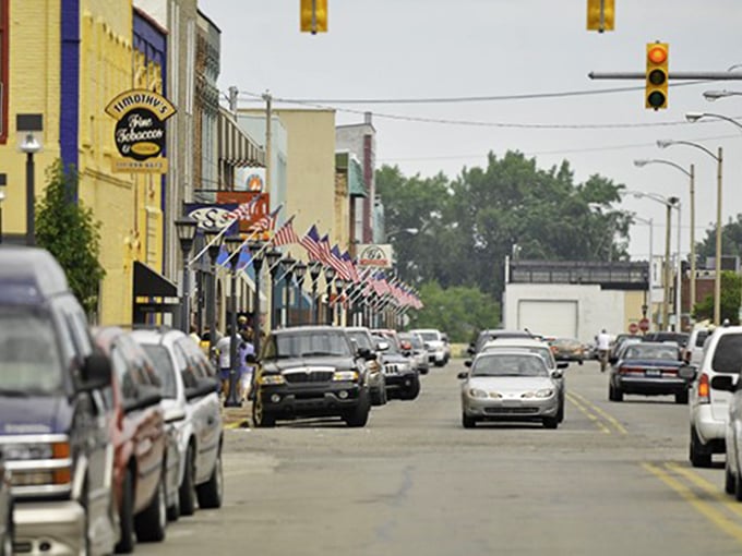 American flags flutter along Main Street in Bay City, where your Social Security check stretches as far as the horizon.