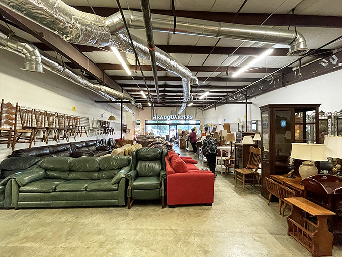 Furniture heaven stretches before you. That green leather couch has stories to tell, while wooden chairs stand ready for their next dinner party debut.